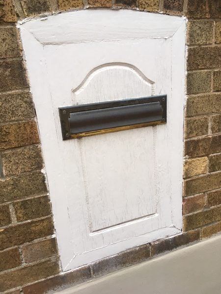 Insulating "milk delivery" box on outside of 1950s brick house ...