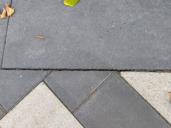 Filing in cracked polymeric sand in between pavers - RedFlagDeals.com ...